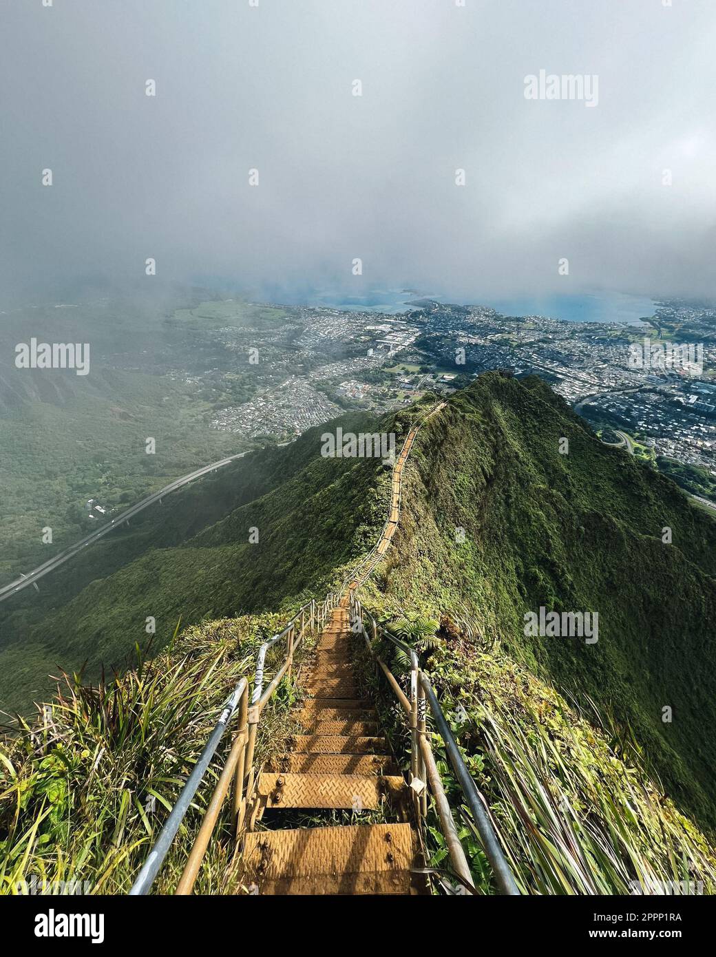 Man Hiking Stairway to Heaven (Haiku Stairs) on Oahu, Hawaii. High ...
