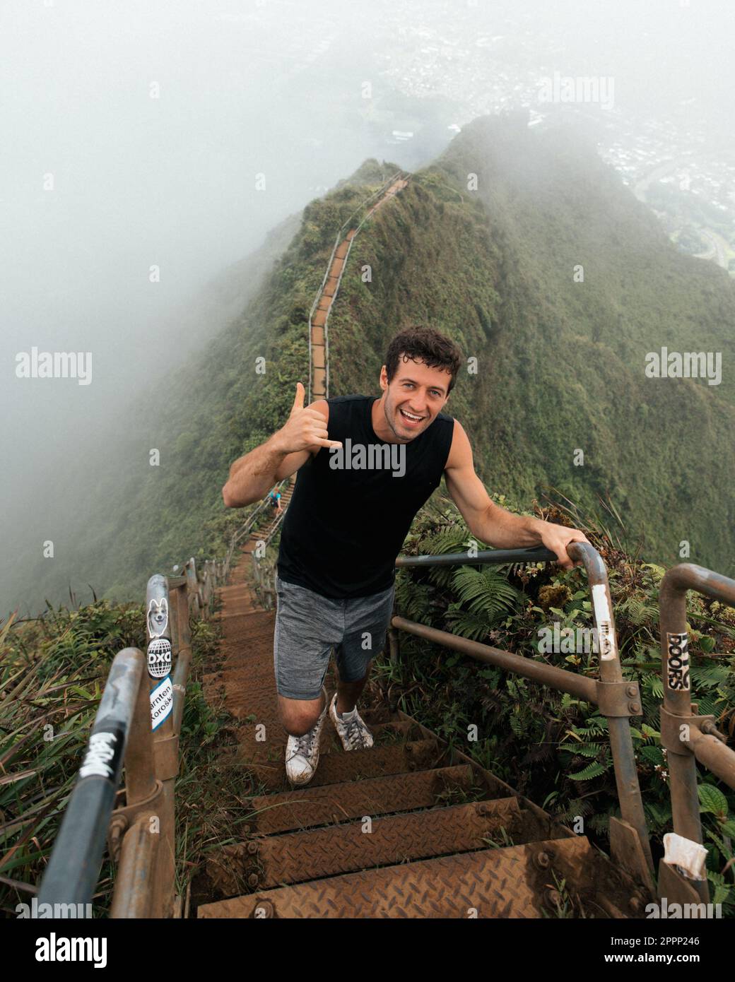 Man Hiking Stairway to Heaven (Haiku Stairs) on Oahu, Hawaii. High ...