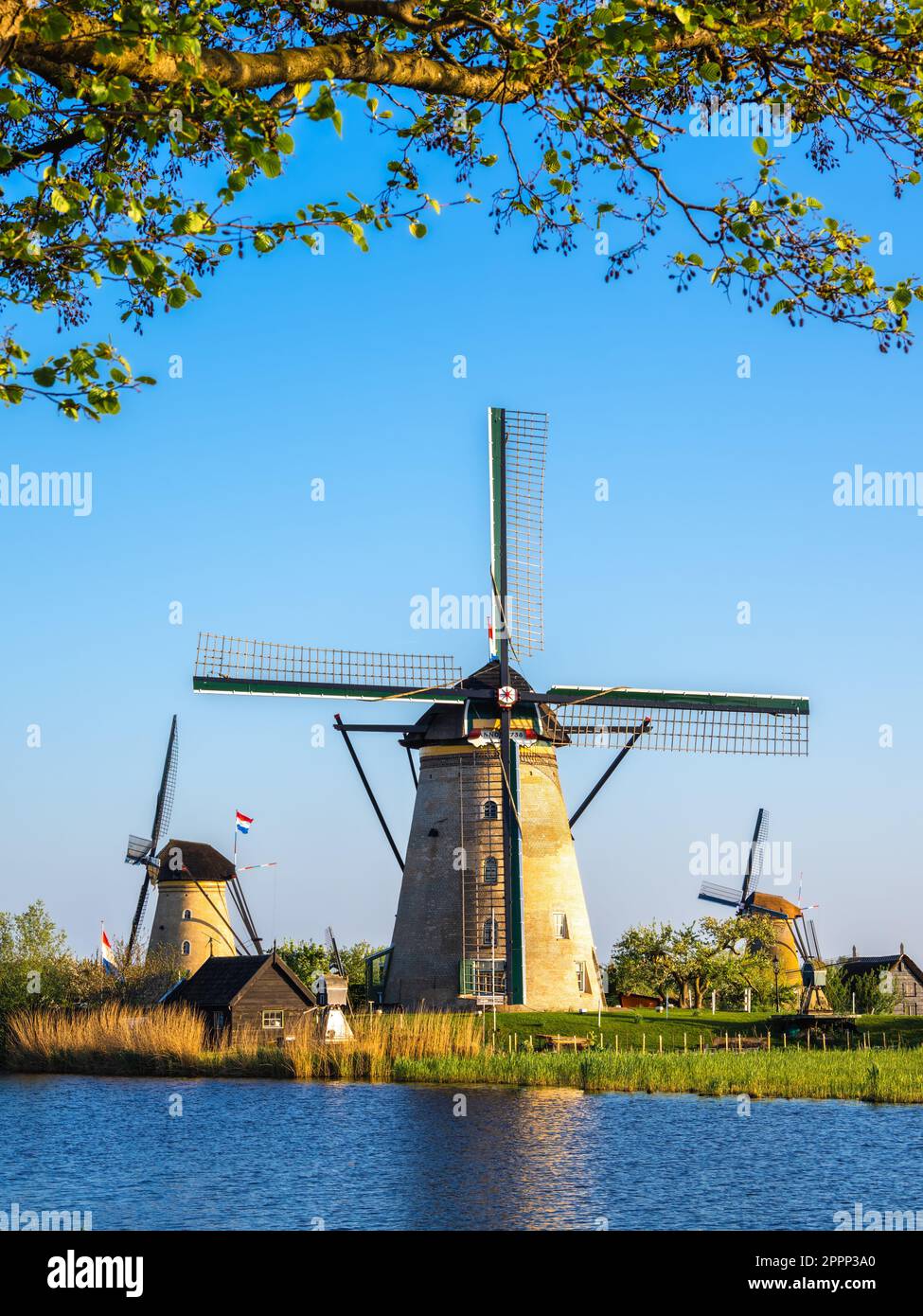 The windmills at Kinderdijk are a group of 19 monumental windmills in ...