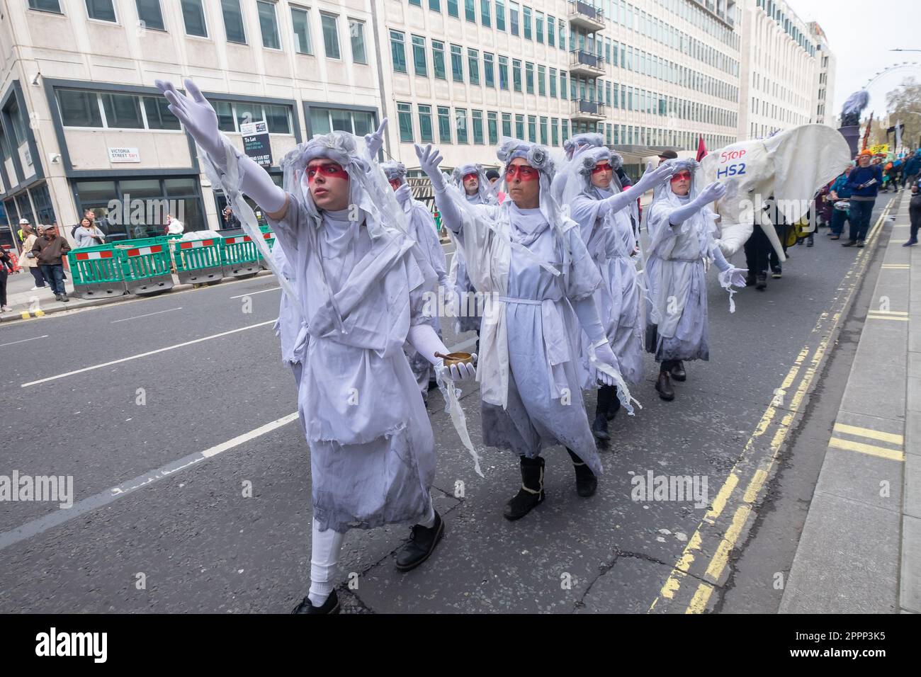 London, UK. 24 Apr 2024. A procession from the Department for Energy ...