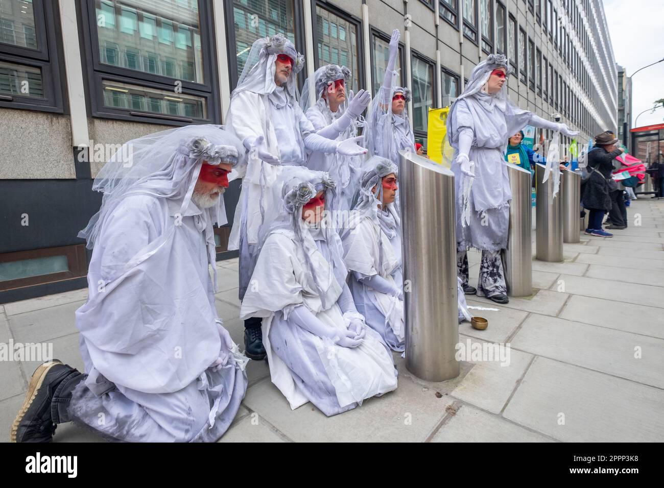 London, UK. 24 Apr 2024. Smoke mimes. The procession gathers at the ...