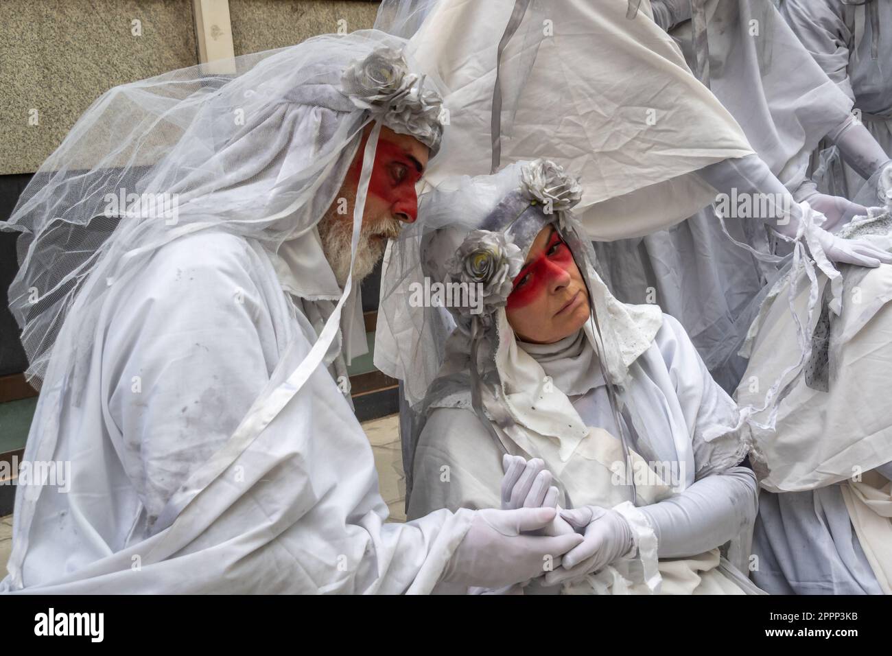 London, UK. 24 Apr 2024. Smoke mimes. The procession gathers at the ...