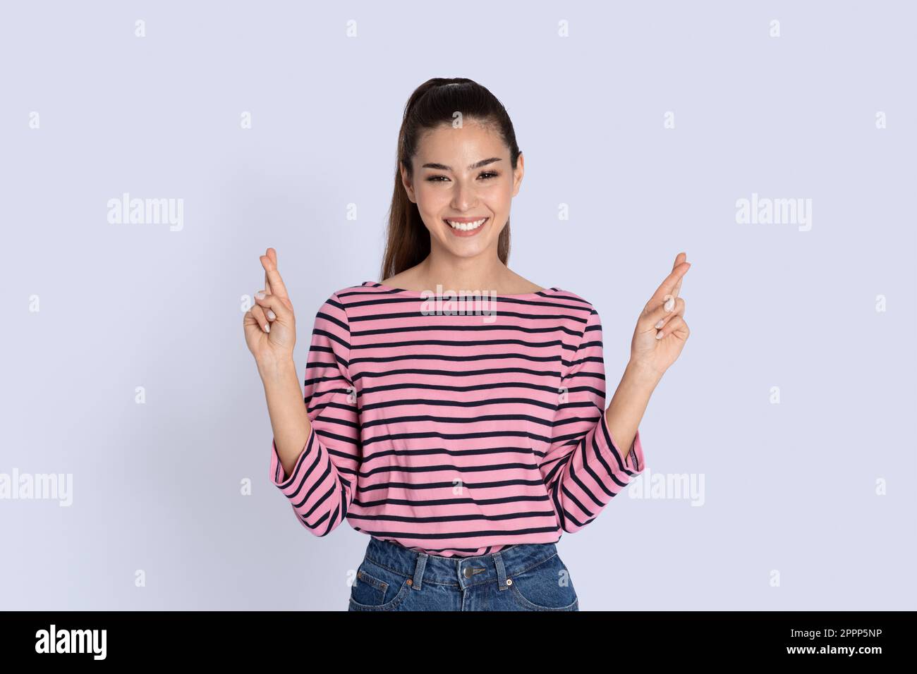 Happy woman good luck sign hi-res stock photography and images - Alamy