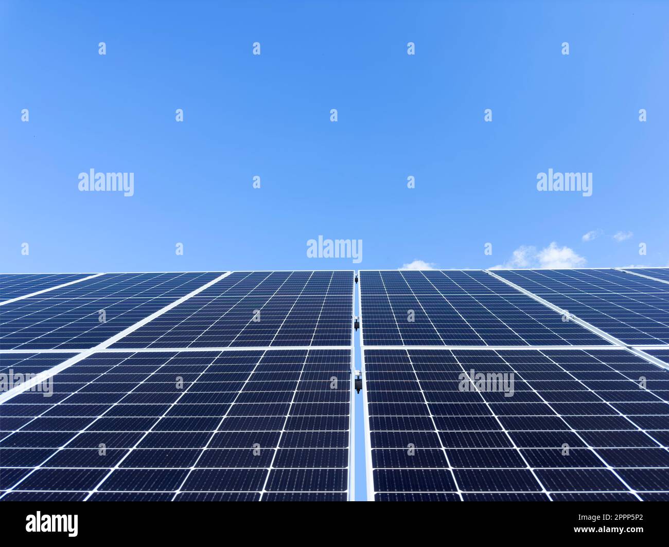 Blue Solar panel over blue sky, sun and clouds. Solar panels pattern ...