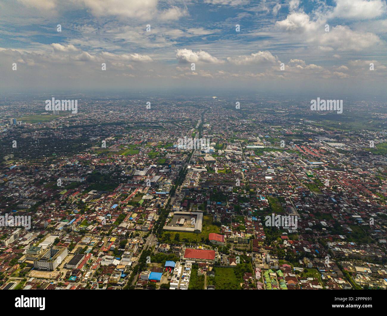 Aerial drone of Medan city with residential areas and houses. Sumatra ...