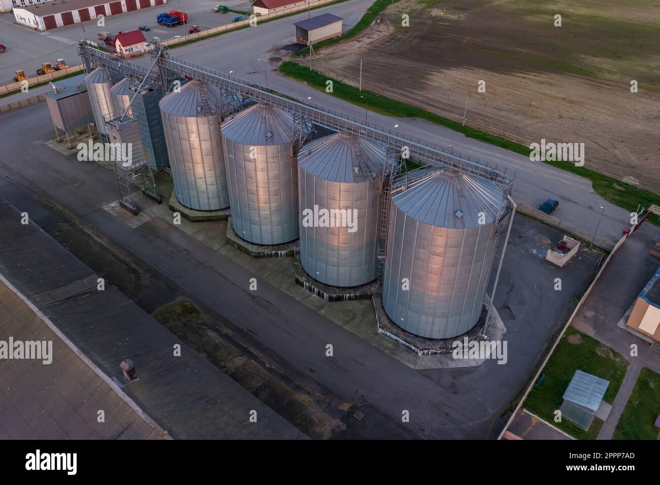 aerial panoramic view on agro-industrial complex with silos and grain ...