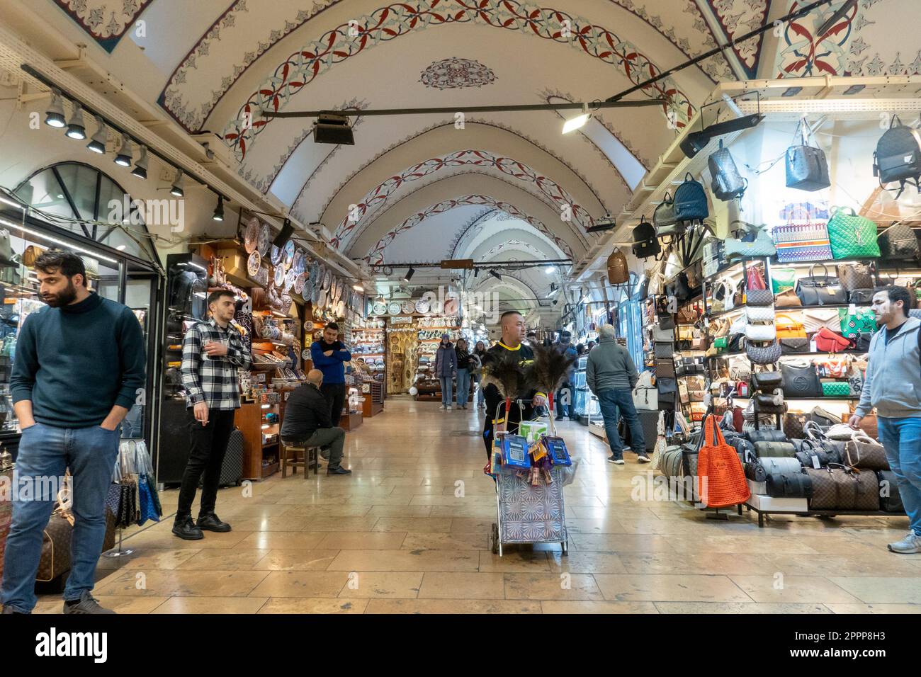 People explore The Grand Bazaar in Istanbul, one of the largest and ...