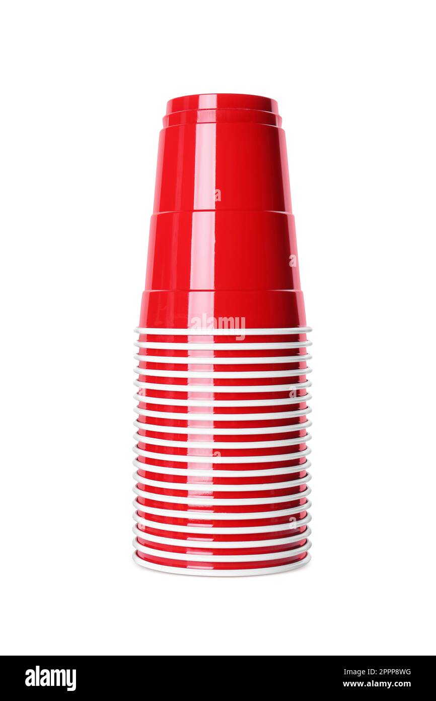 Red plastic cups on white background. Beer pong game Stock Photo - Alamy