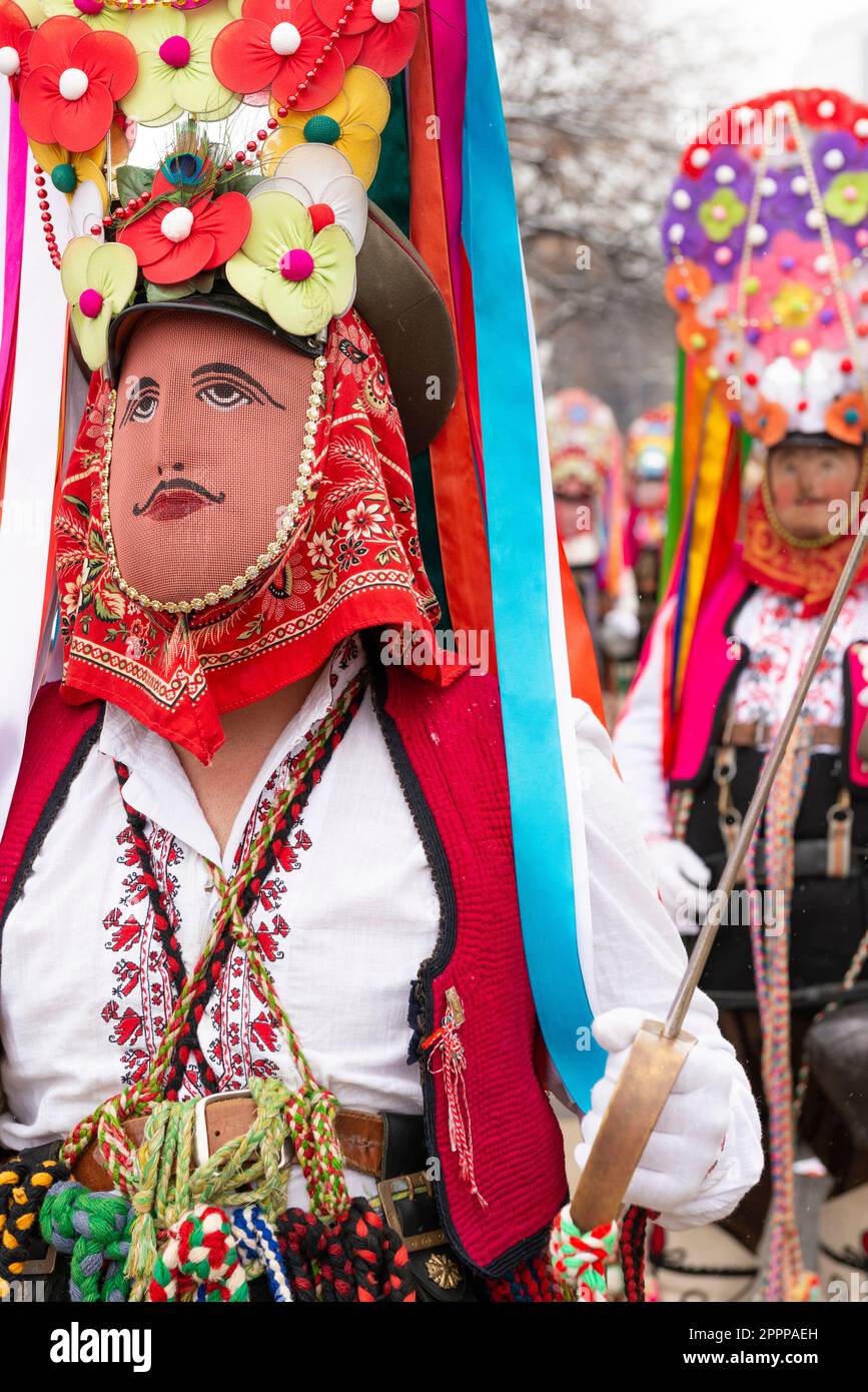 Kukeri dancers with colorful masks from Central Bulgaria called Startsi ...