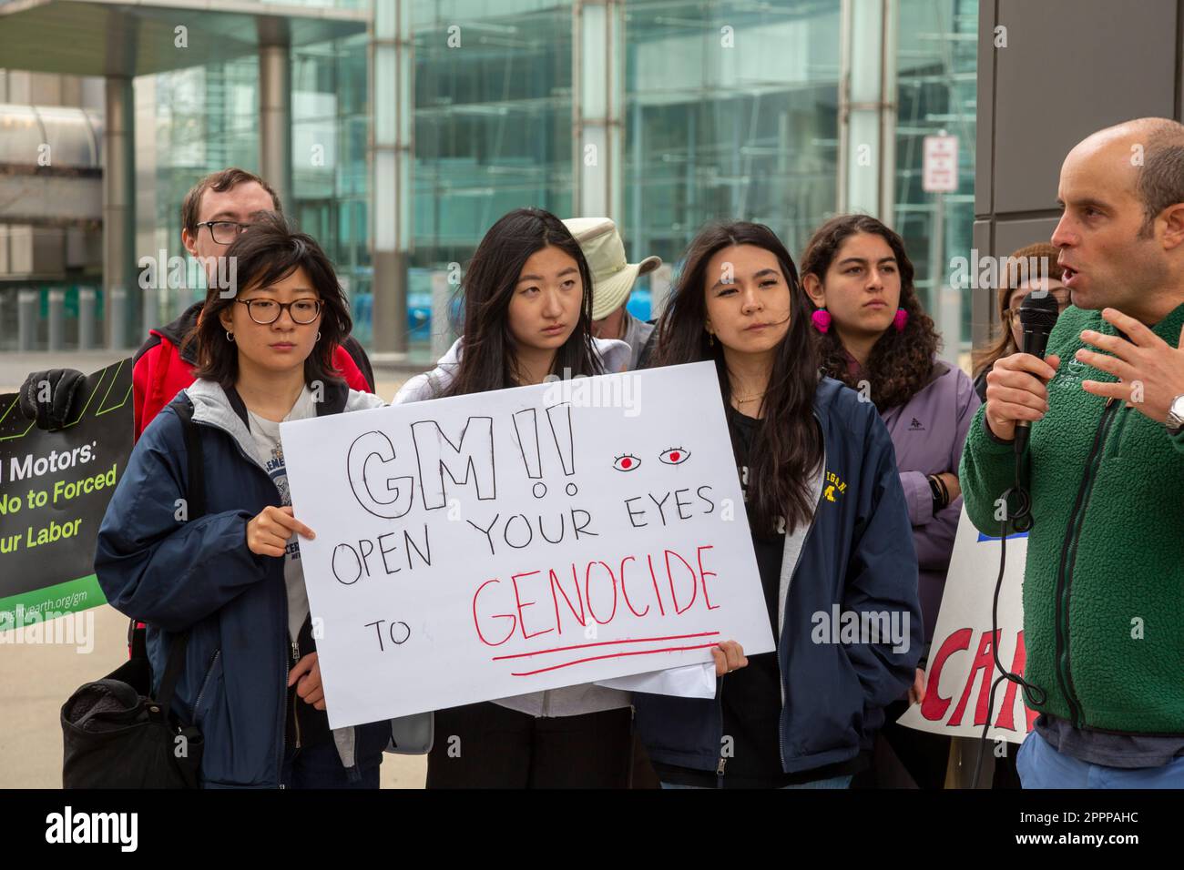 Detroit, Michigan - People gather outside General Motors' headquarters ...