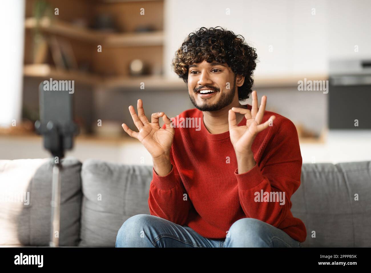 Indian Guy Recording Video At Home With Smartphone On Tripod Stock ...