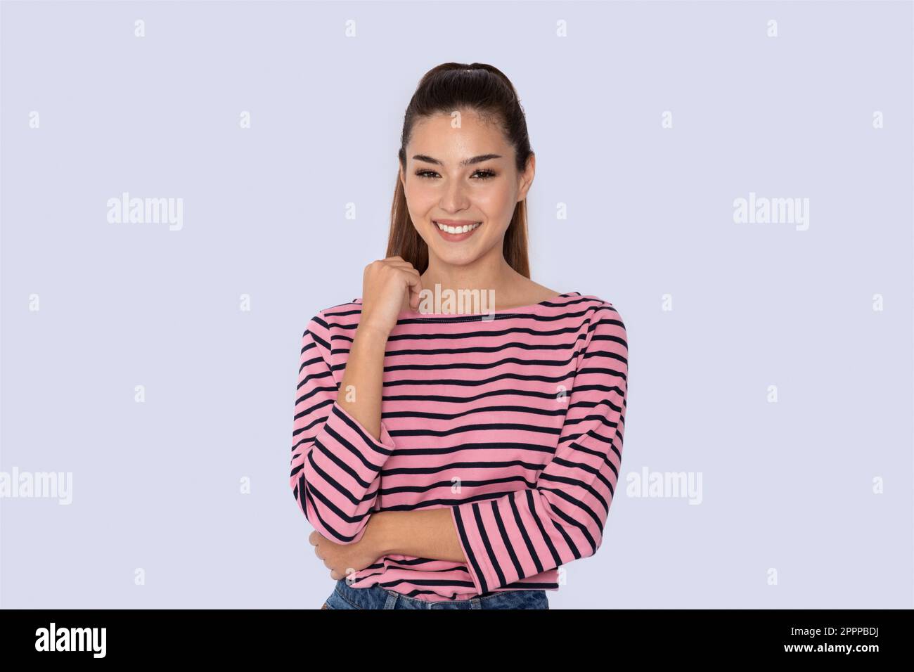 Cheerful young hispanic lady posing on grey studio background Stock ...