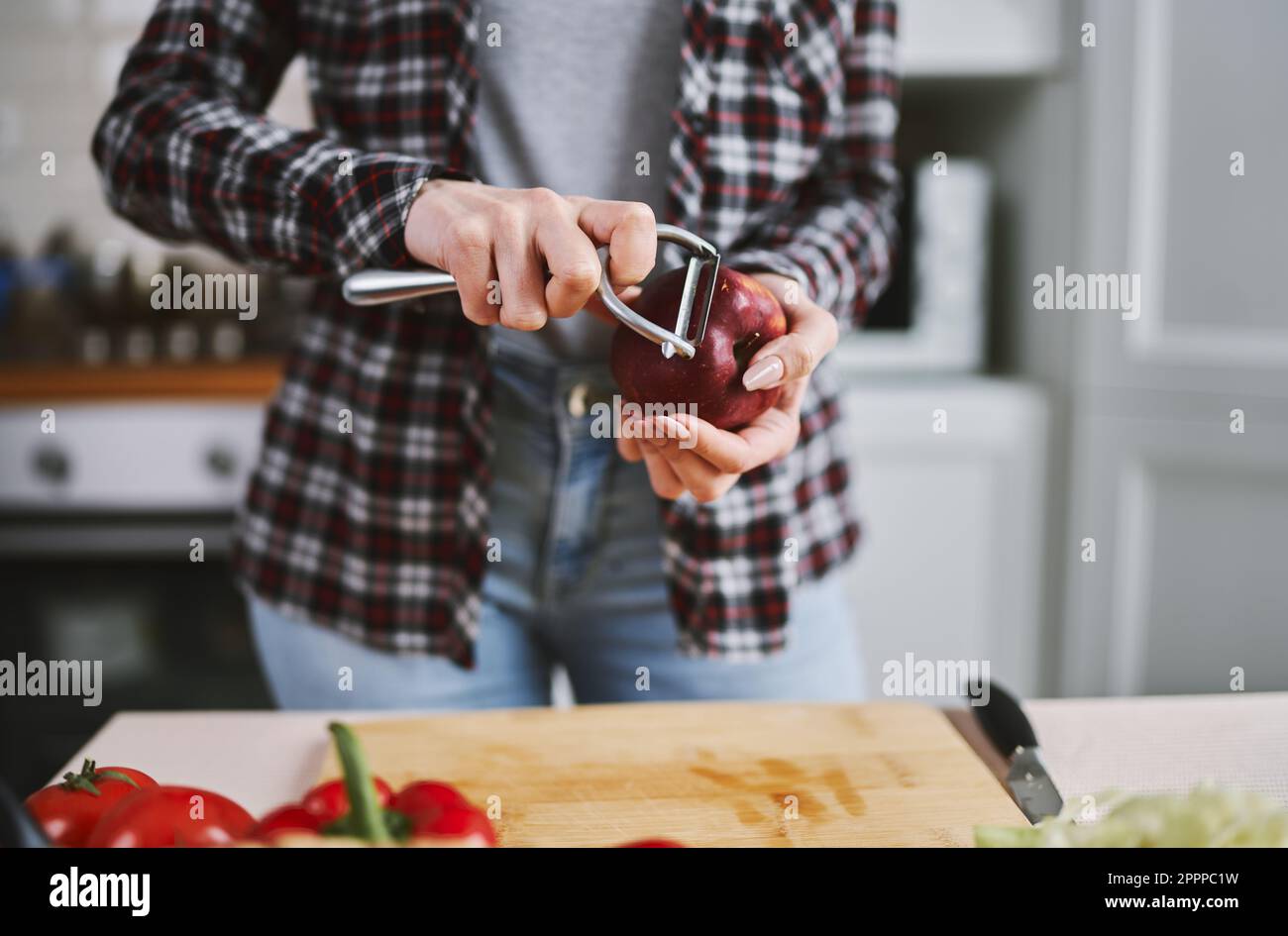 Woman peeling apples hi-res stock photography and images - Alamy
