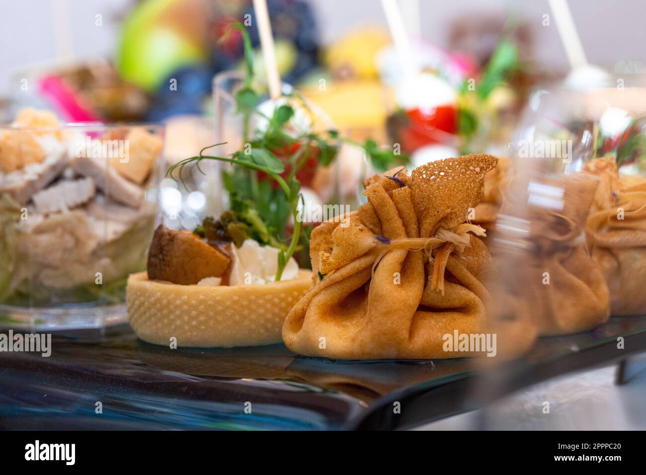 pancake bag with filling on the buffet table with snacks Stock Photo ...