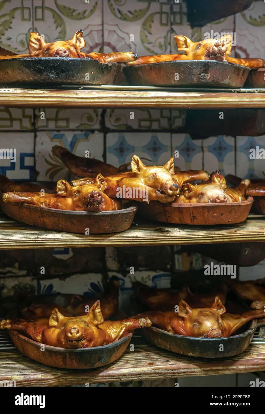 A pile of Cochinillos Asados waiting to be served in a restaurant ...