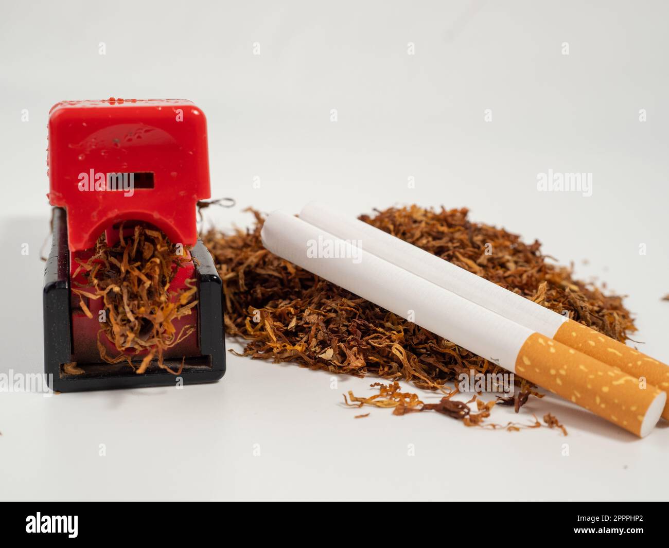 Tobacco and filling machine. Cigarettes and tobacco. Tobacco close-up ...