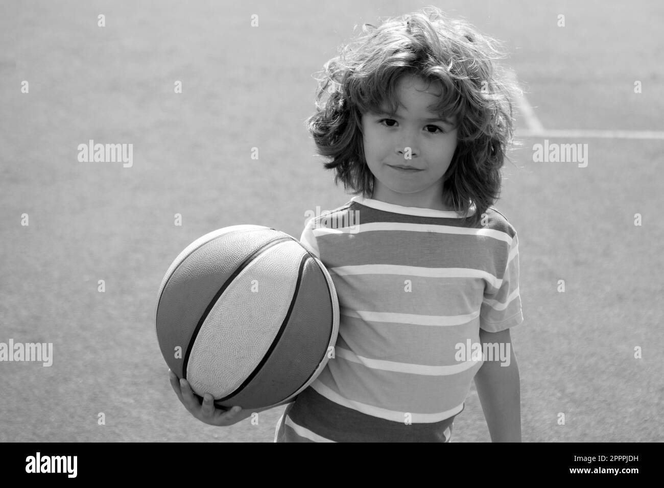 Basketball kids training game. Portrait of sporty child. Young boy ...