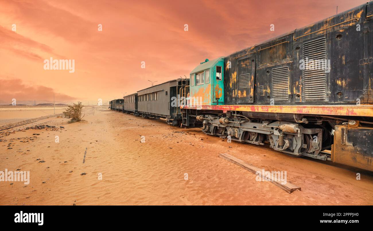 Old unused diesel locomotive and train at Wadi Rum railroad station ...