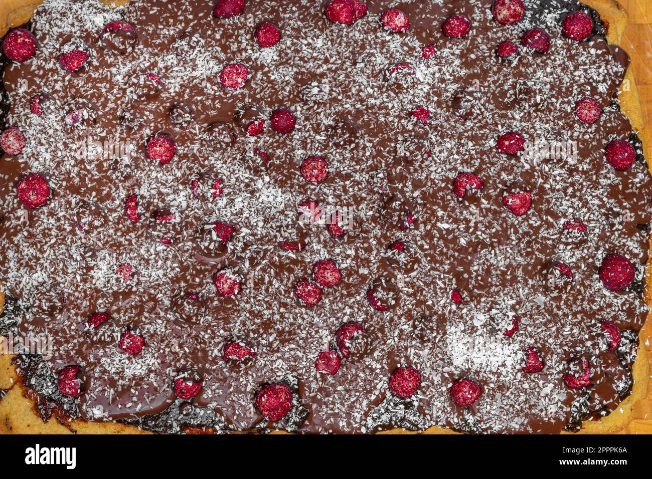 Marijuana cake with dry red currants and chocolate on arabic color ...