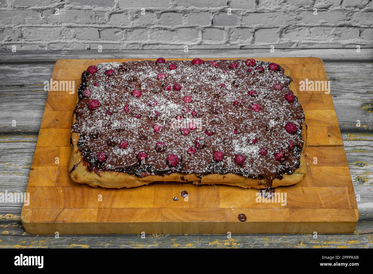 Marijuana cake with dry red currants and chocolate on arabic color ...