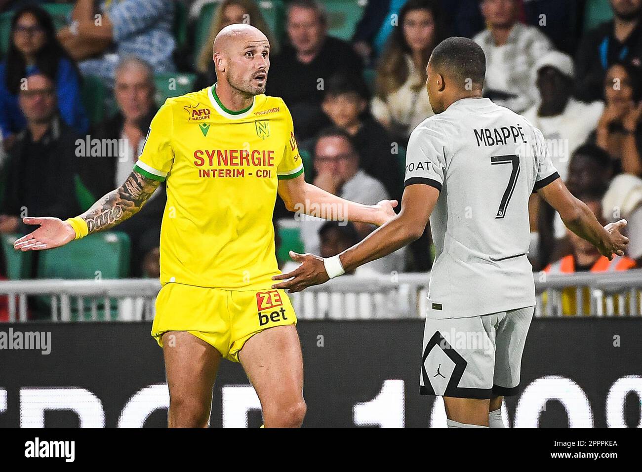 Nicolas PALLOIS of Nantes and Kylian MBAPPE of PSG during the French ...