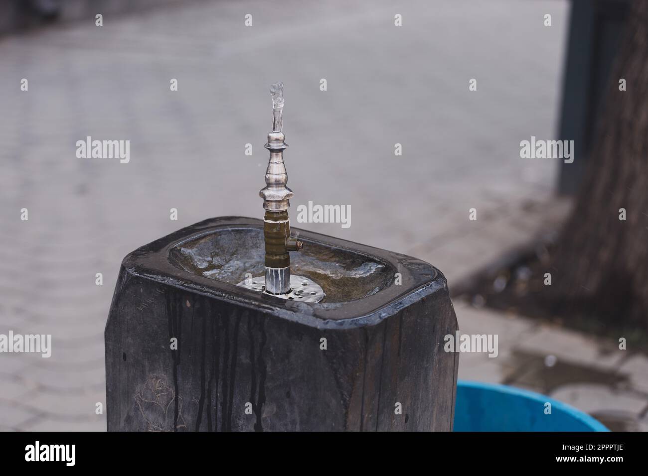 Drinking water fountain in park on urban background, no person. Close ...