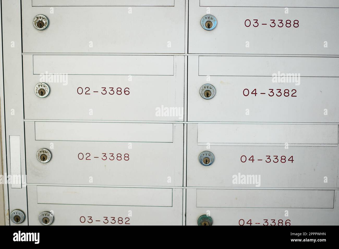 orange color storage box in public place. safe storage locker for ...