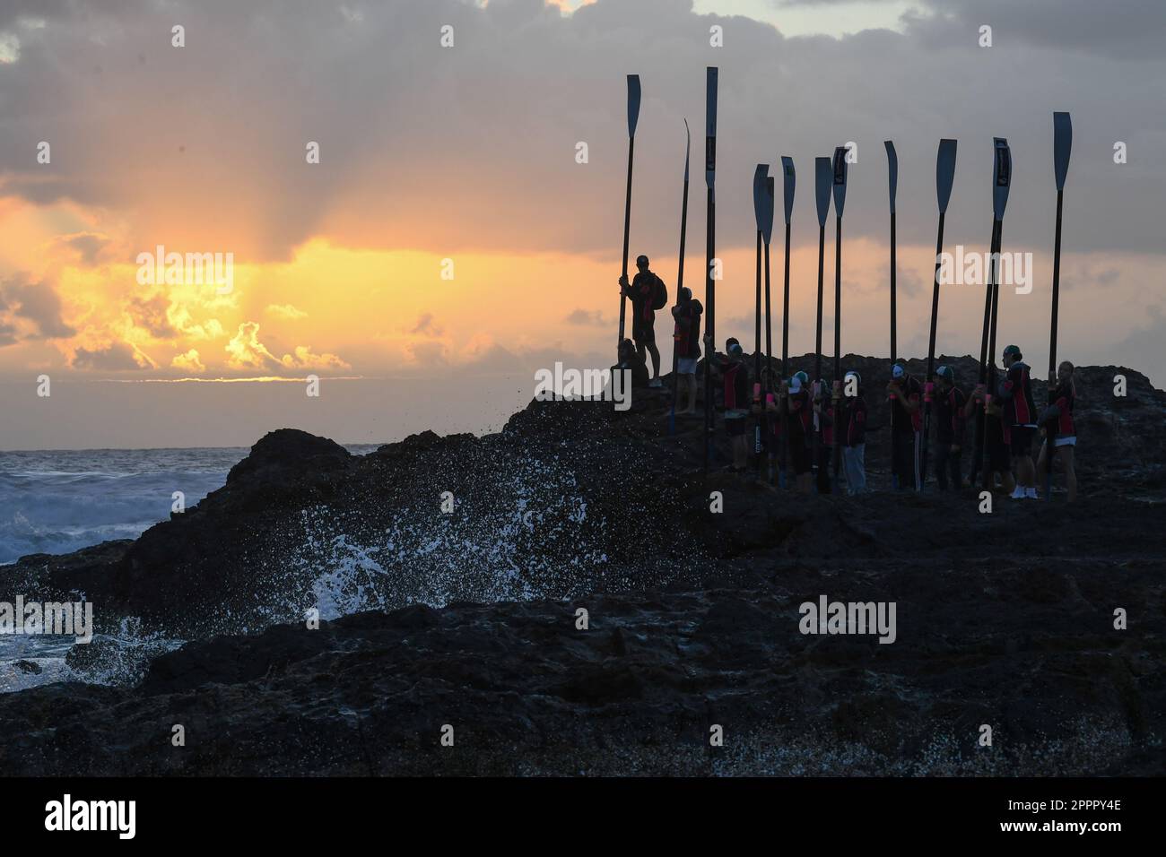 Club members hold oars for a symbolic burial at sea during the Anzac ...