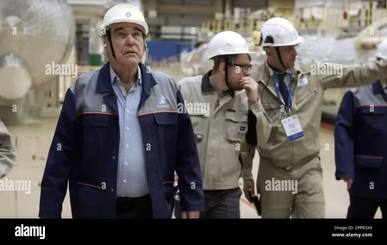 NUCLEAR NOW, director Oliver Stone (front), 2022. © Abramorama ...