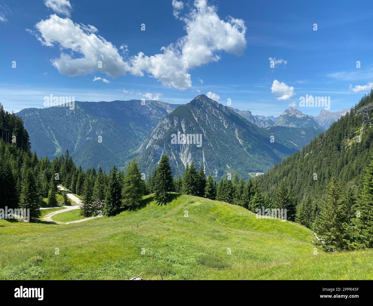 An aerial view of the rocky scenic Austrian Alps near the Achensee Lake ...