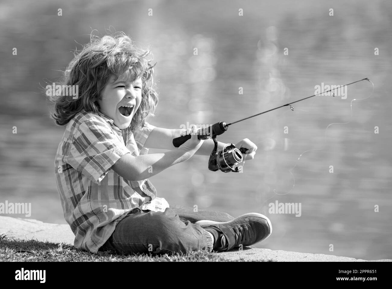 Portrait of excited amazed child boy fishing. Child surprised fishing ...