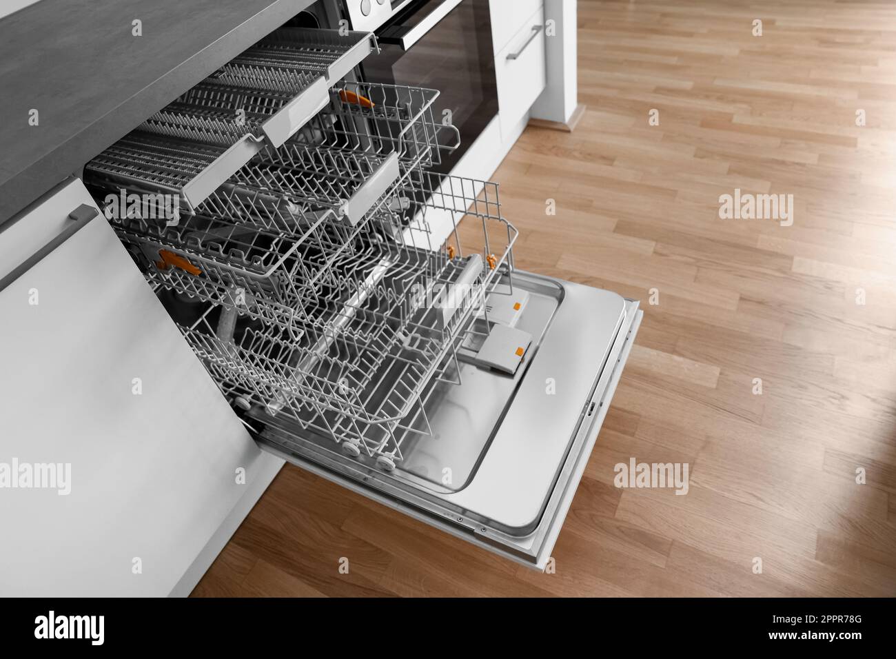Open dishwasher in modern kitchen Stock Photo - Alamy