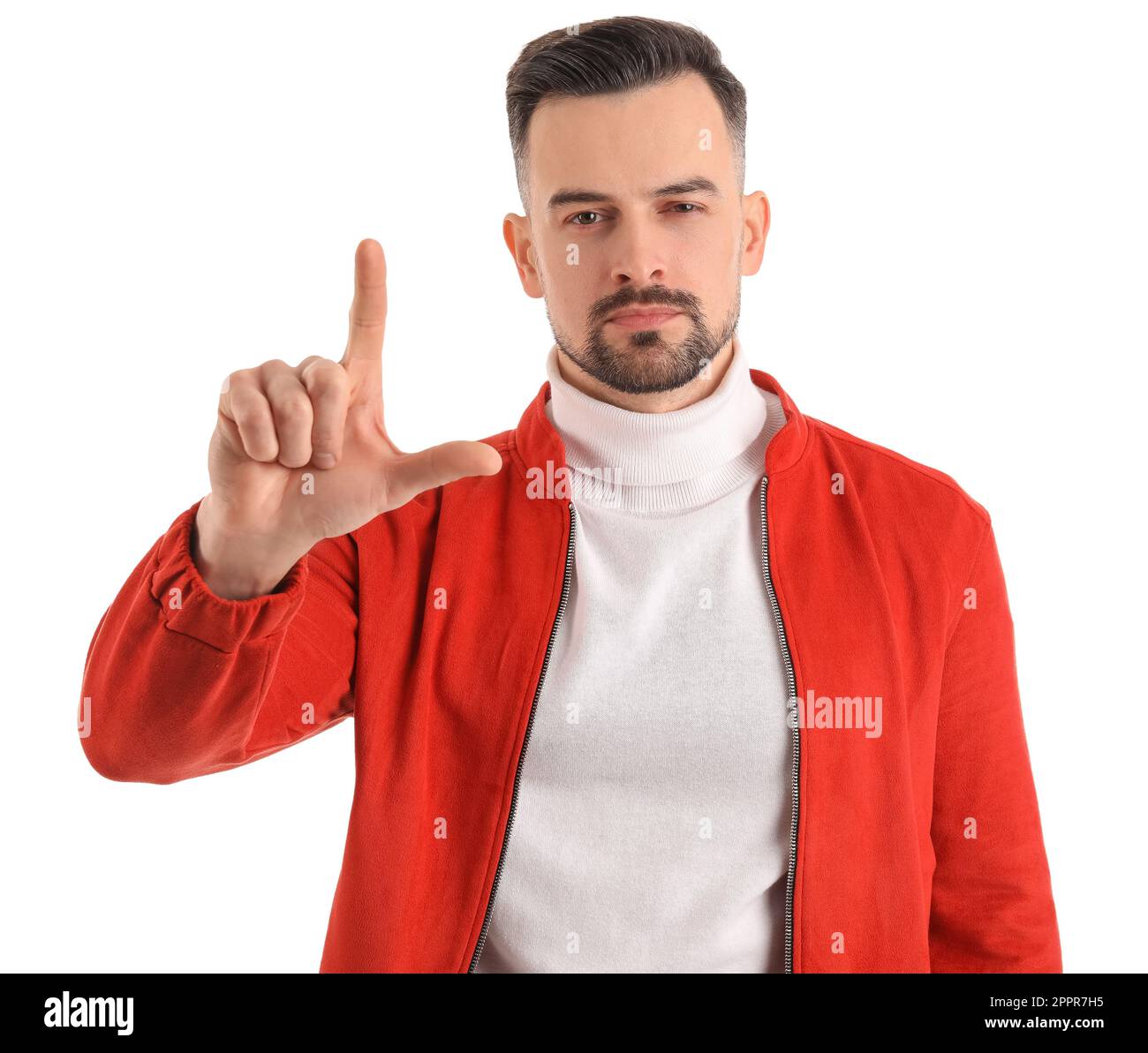 Handsome man showing loser gesture on white background Stock Photo - Alamy
