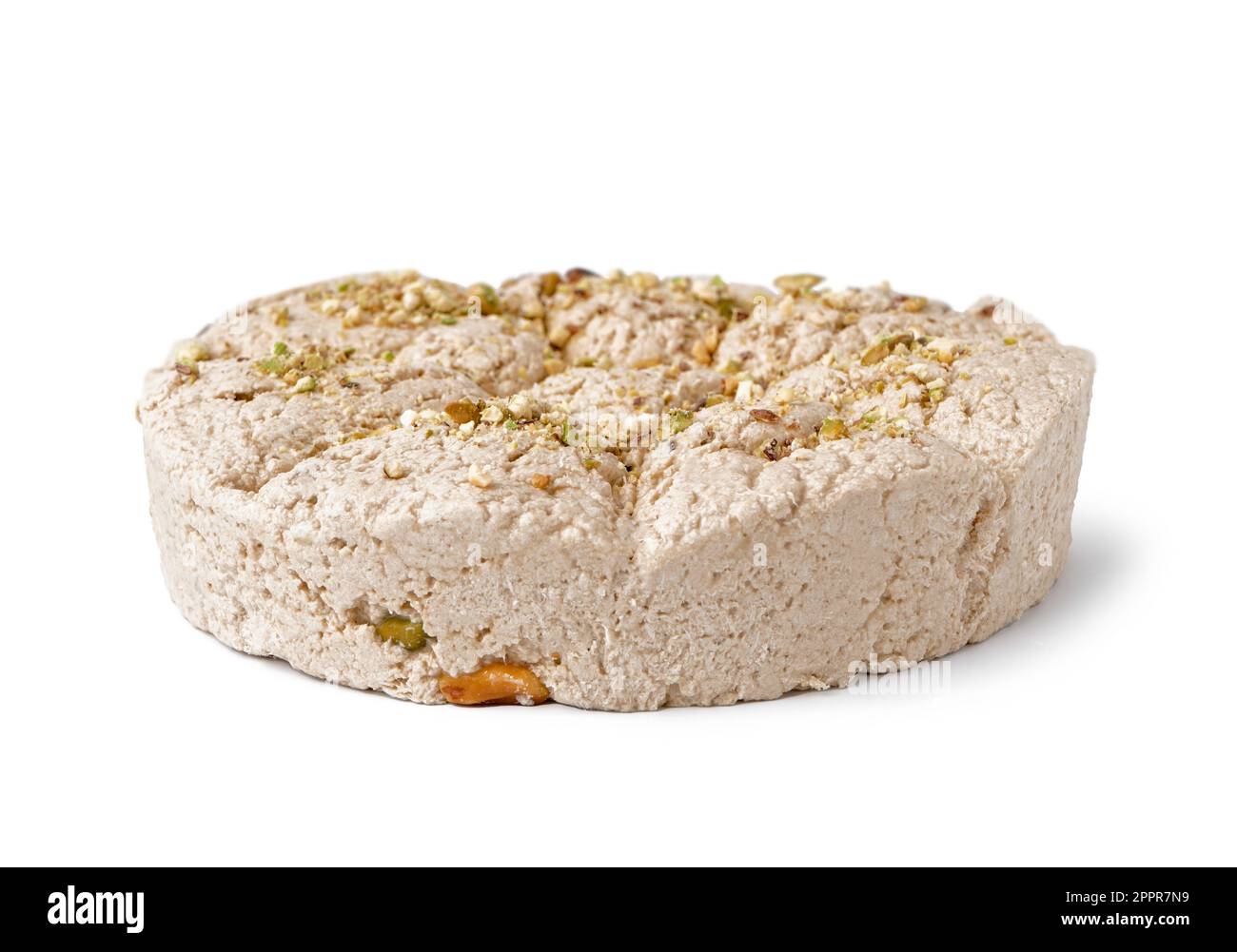 Tasty Tahini halva with pistachios on white background Stock Photo - Alamy