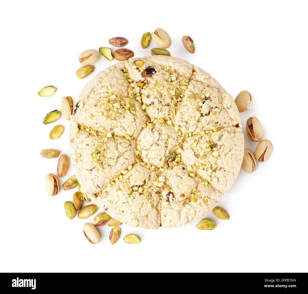 Tasty Tahini halva with pistachios on white background Stock Photo - Alamy