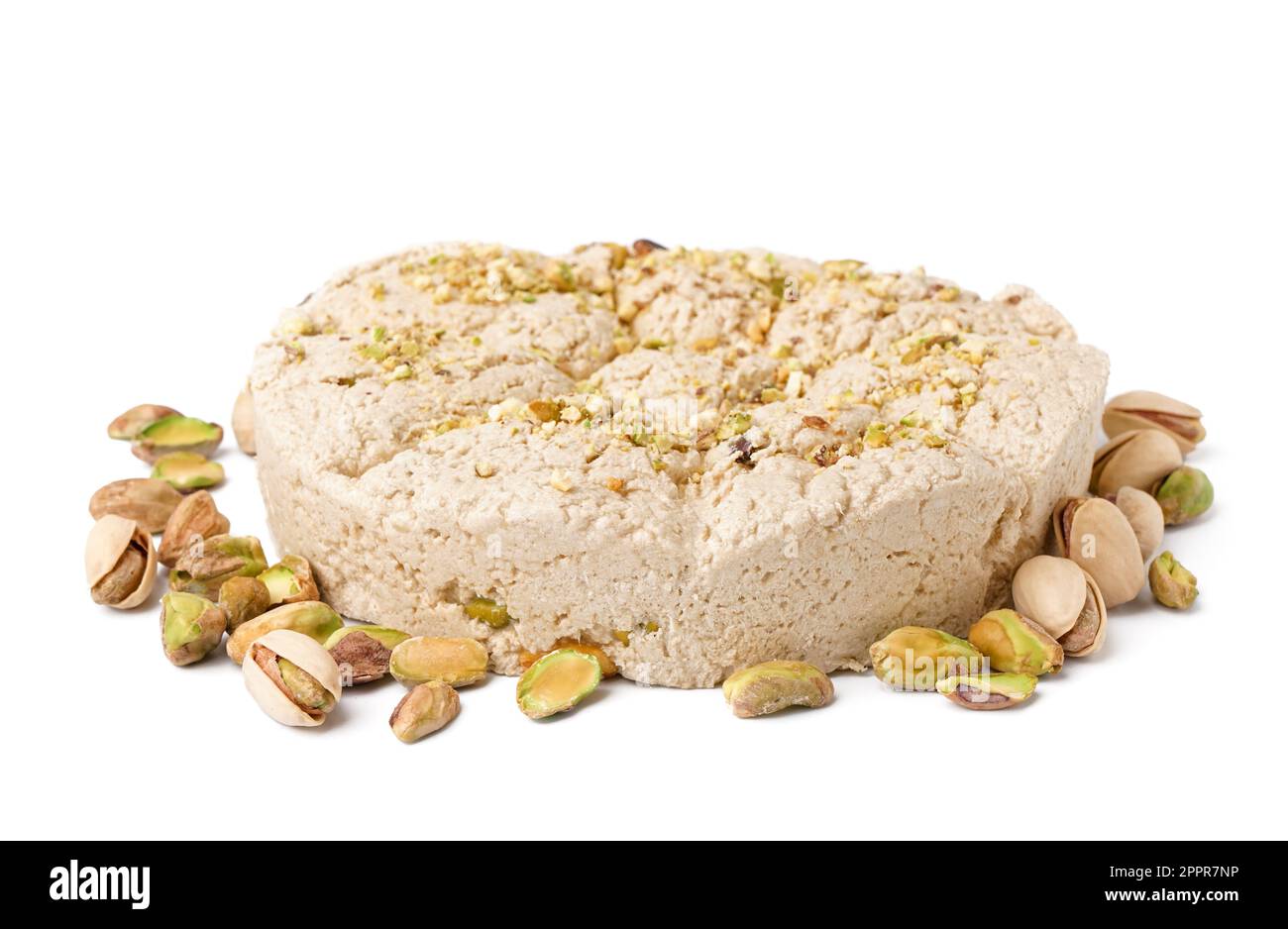 Tasty Tahini halva with pistachios on white background Stock Photo - Alamy