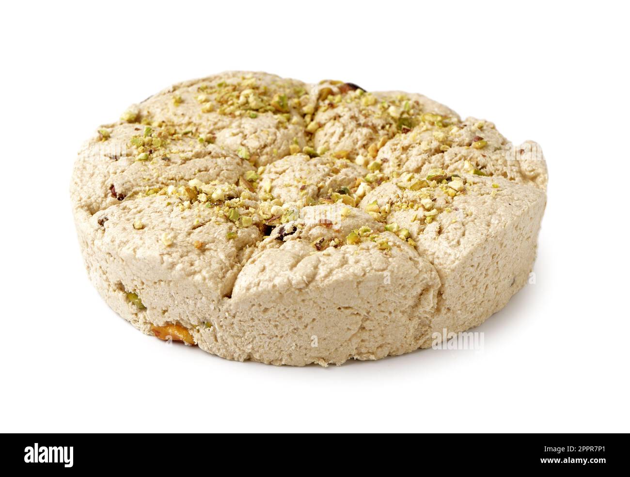 Tasty Tahini halva with pistachios on white background Stock Photo - Alamy