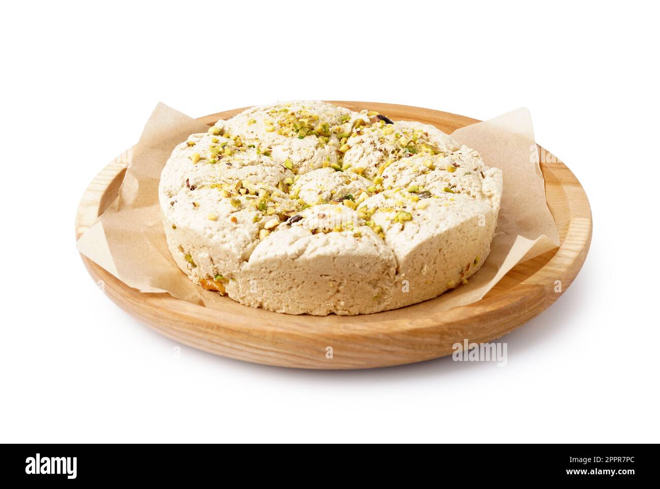 Plate of tasty Tahini halva with pistachios on white background Stock ...