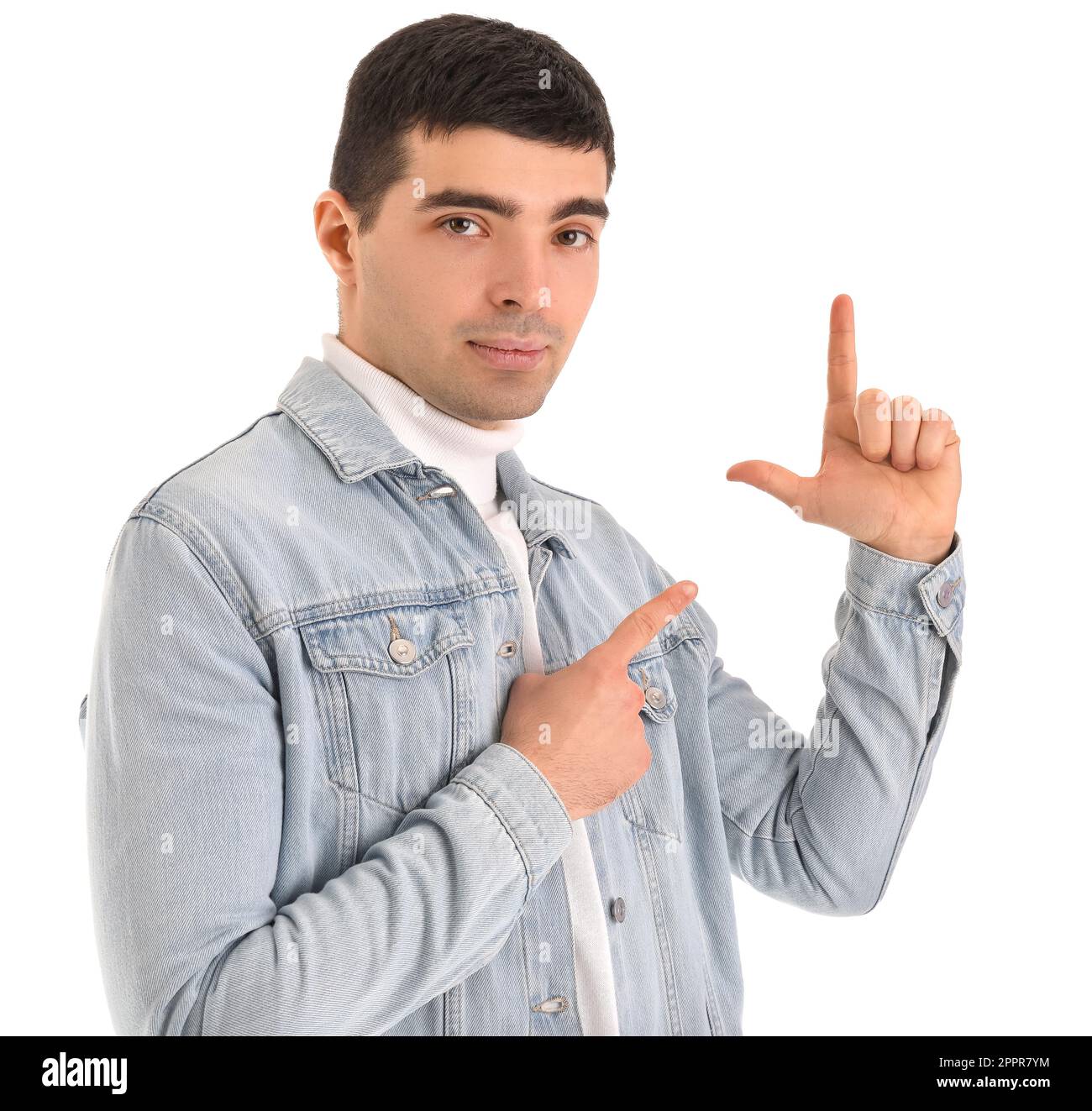 Young man showing loser gesture on white background Stock Photo - Alamy