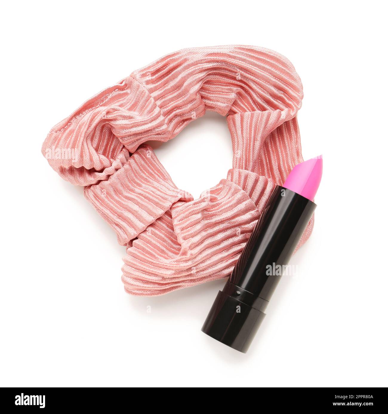 Stylish scrunchy and lipstick on white background Stock Photo - Alamy