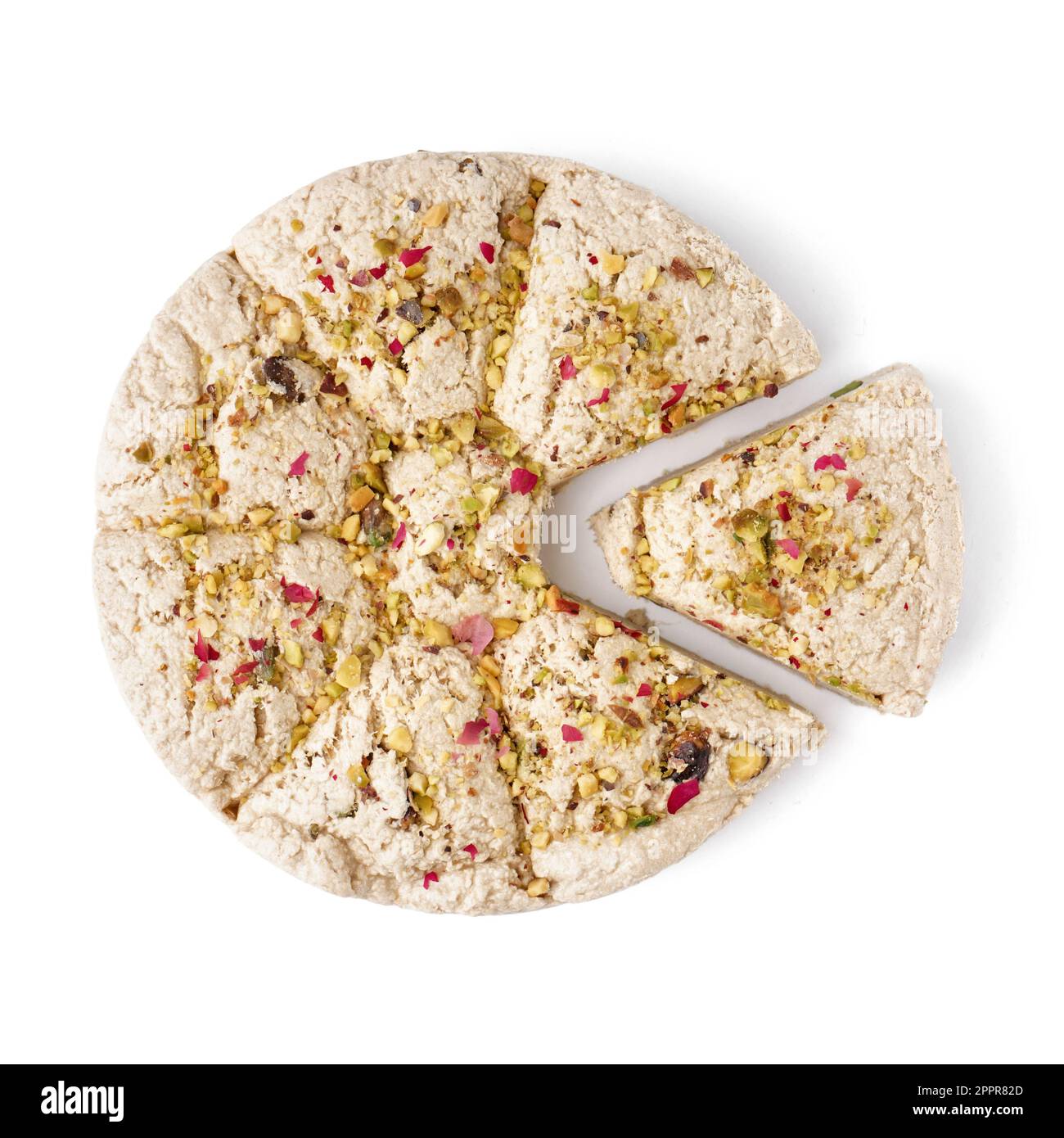 Tasty Tahini halva with pistachios on white background Stock Photo - Alamy