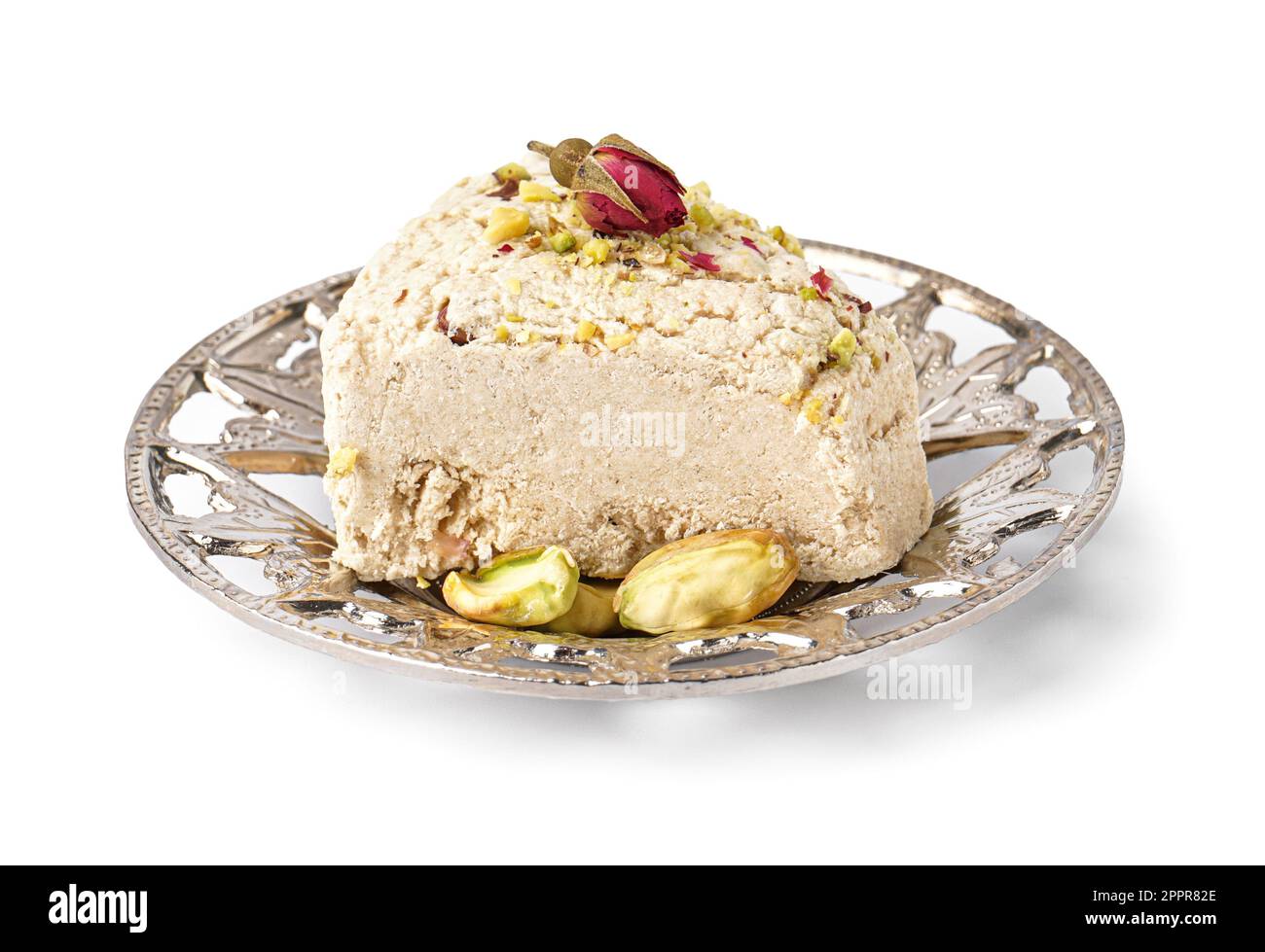 Plate with piece of tasty Tahini halva on white background Stock Photo ...