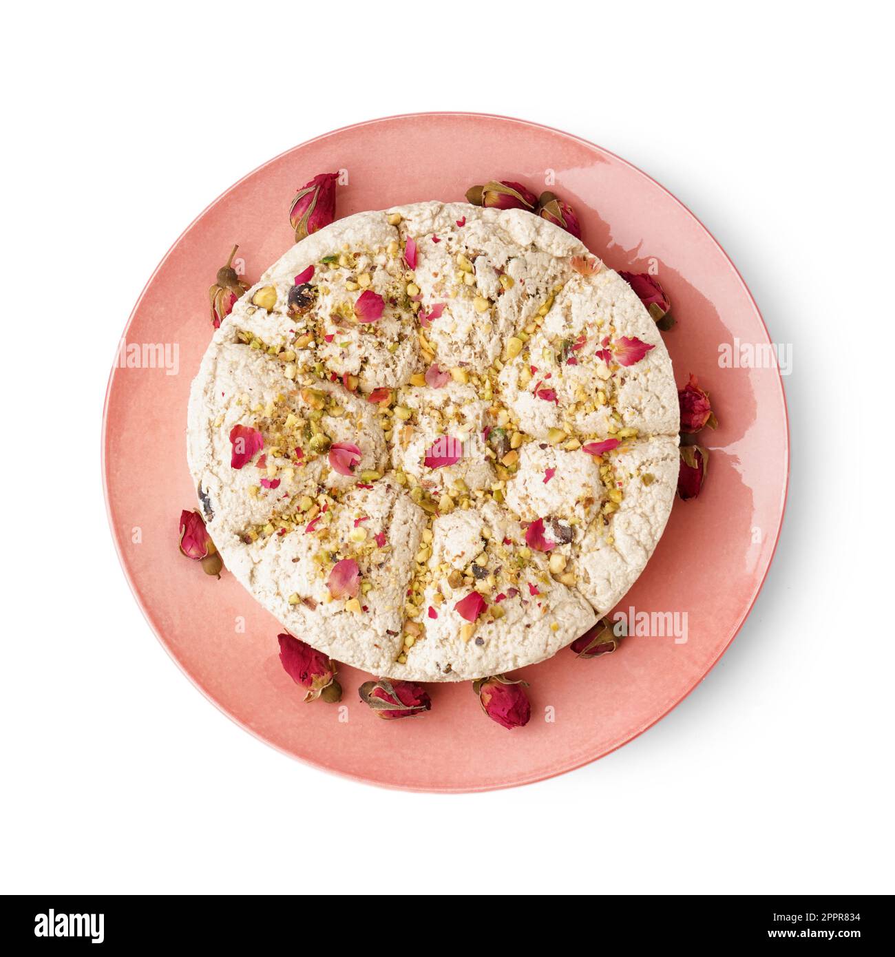 Plate of tasty Tahini halva with pistachios on white background Stock ...