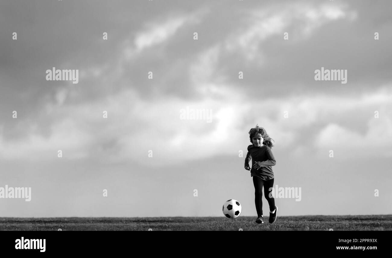 Soccer child play football. Little boy shooting at goal, kid kicking ...