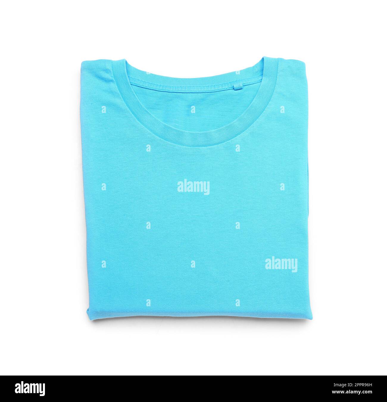 Folded blue t-shirt on white background Stock Photo - Alamy
