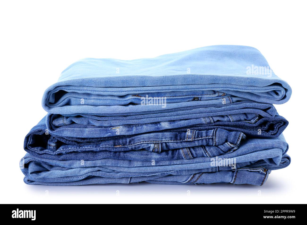 Stack of jeans on white background Stock Photo - Alamy