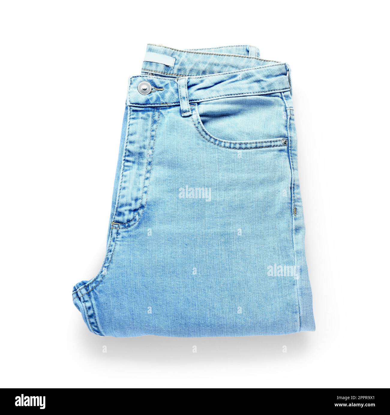 Folded jeans on white background Stock Photo - Alamy