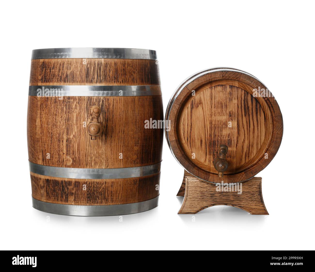 Wooden barrels isolated on white background Stock Photo - Alamy