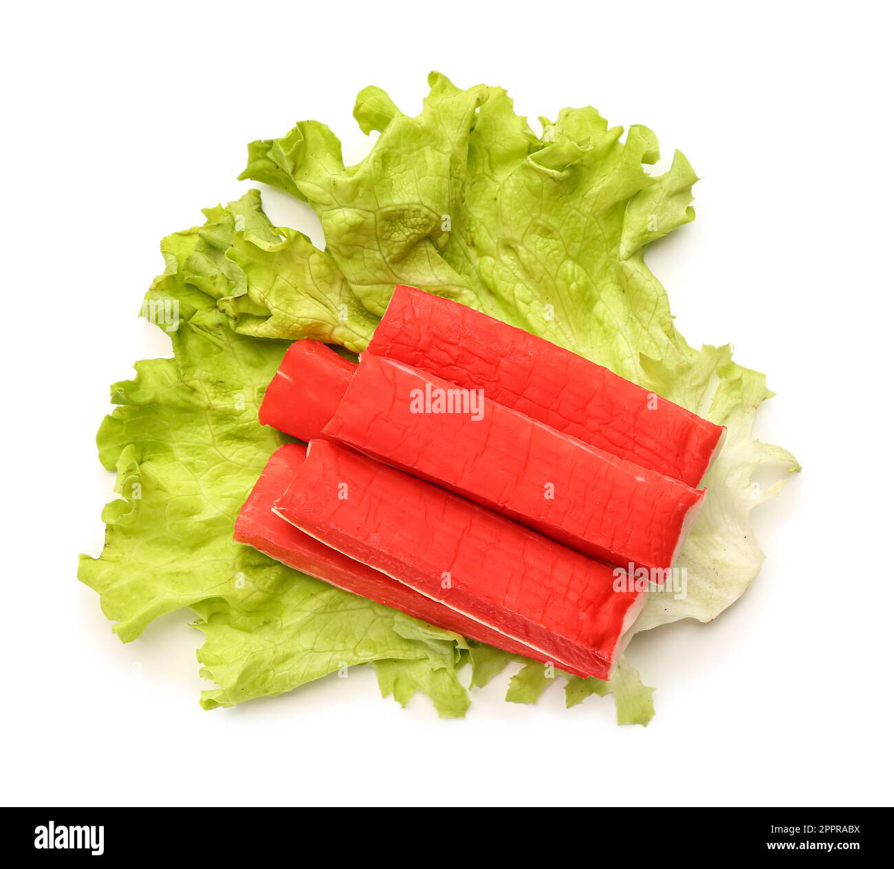 Tasty crab sticks with lettuce isolated on white background Stock Photo ...