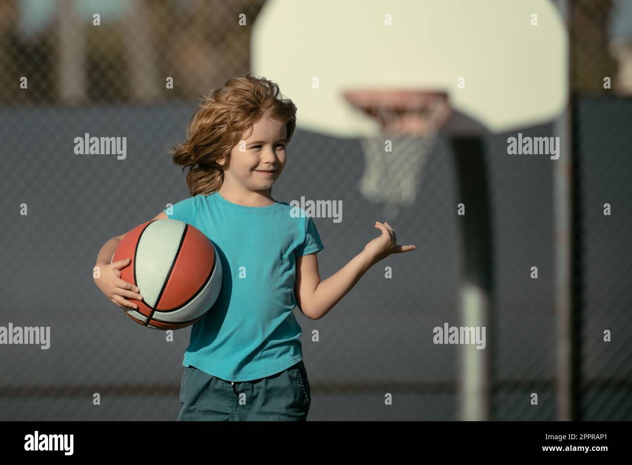 Cute child playing basketball. Active kids lifestyle. Little child boy ...